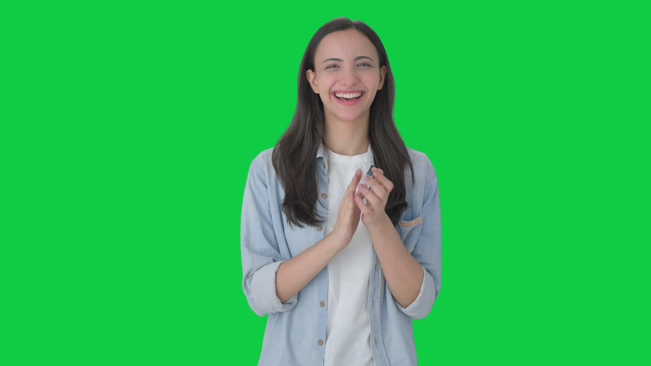 Premium stock video - Happy indian girl clapping and appreciating green ...