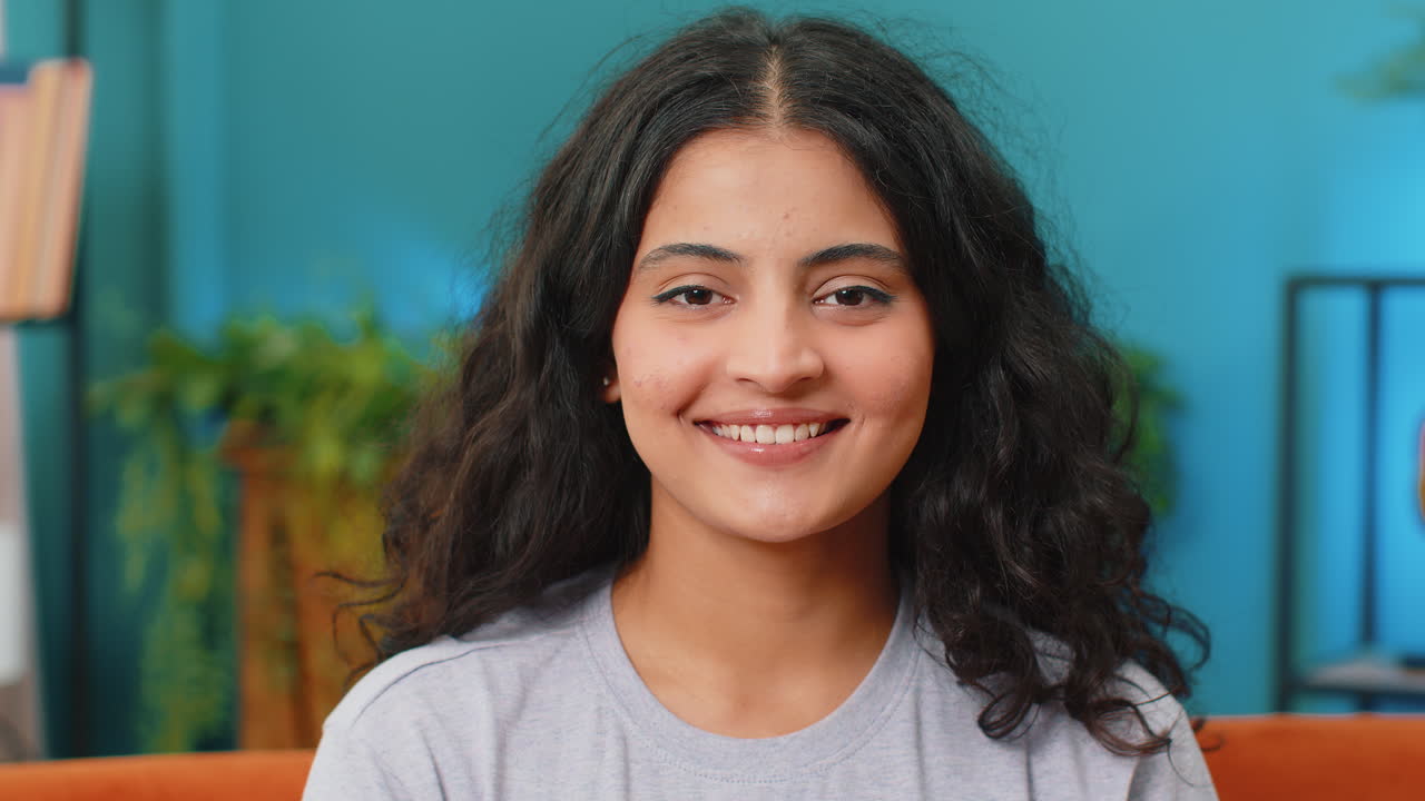 Premium stock video - Happy indian woman smiling friendly, glad ...