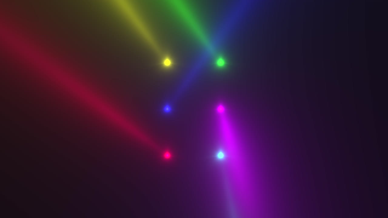 Colorful Glowing Spotlight Beams On Black Gradient Stage Free Motion ...