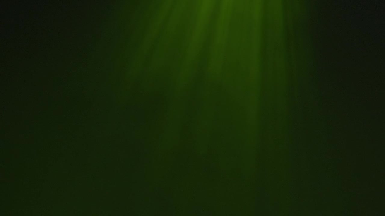 Premium stock video - Light rays shining from above coming through deep ...