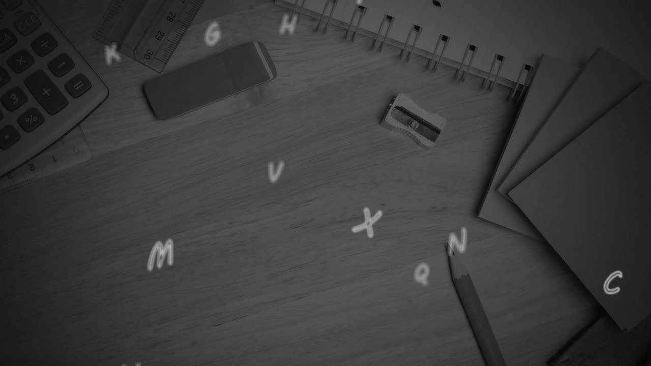 Multiple English Alphabets Floating Against School Stationary Items On ...