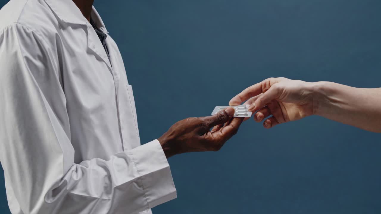 Doctor Giving Medication to Patient | Premium Stock Video Footage