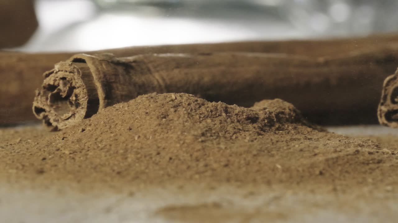 Extreme Close-up Cinnamon Bark Spice Falling Into Cinnamon Powder Free ...