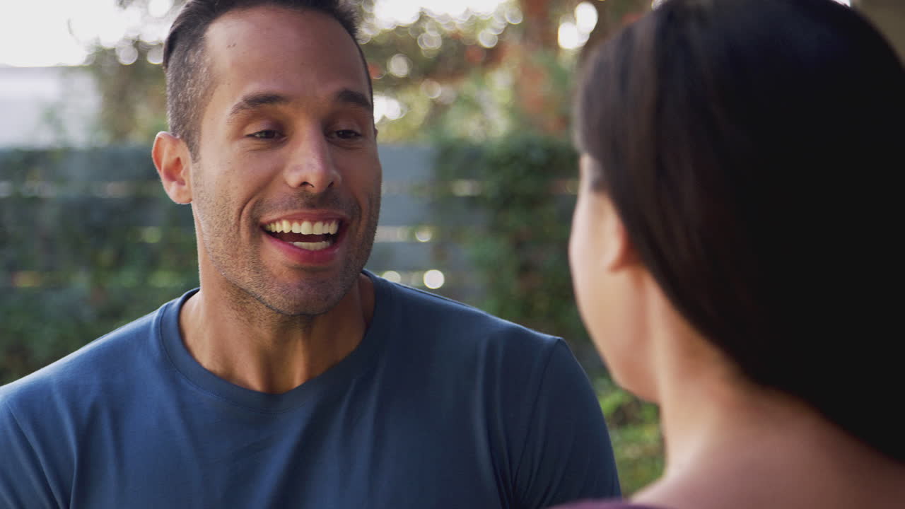 Premium stock video - Smiling hispanic couple talking and laughing in ...