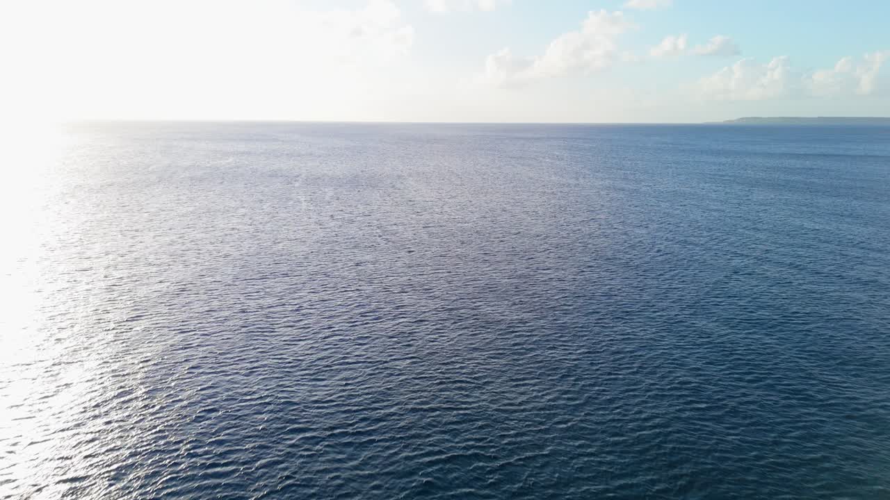 Premium stock video - Sun spreads bright reflecting light as ocean ...