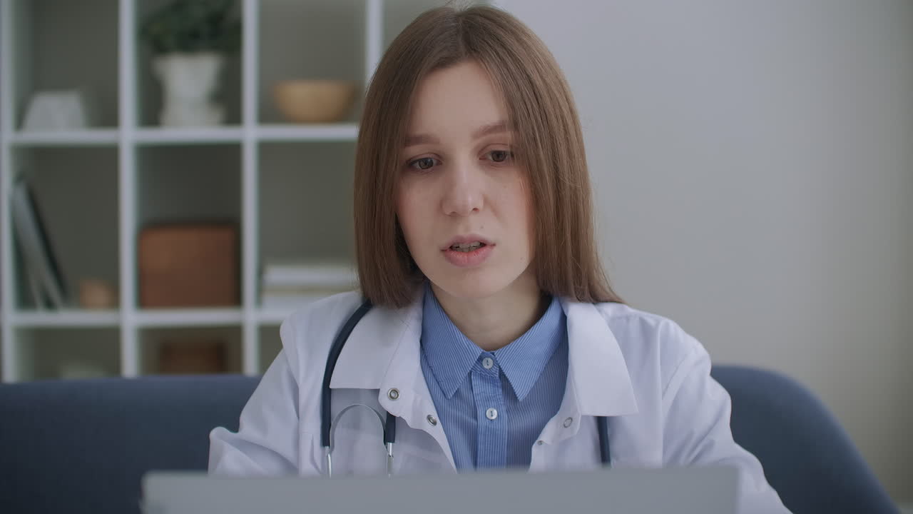 Premium stock video - Consultation of doctor by telephone female ...