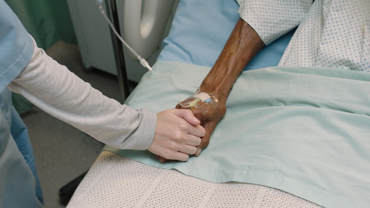 Top View Nurse Touching Hand Of Old Man In Hospital Bed Showing ...