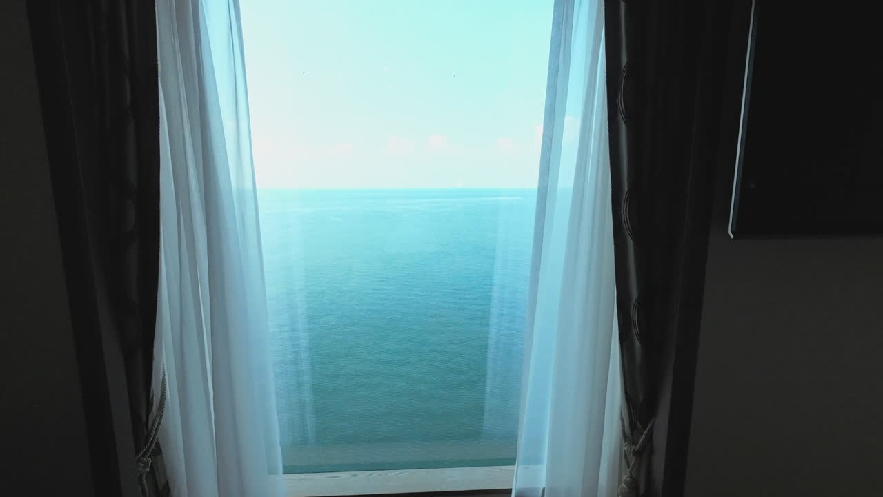Premium stock video - Sea view from cruise window wide view