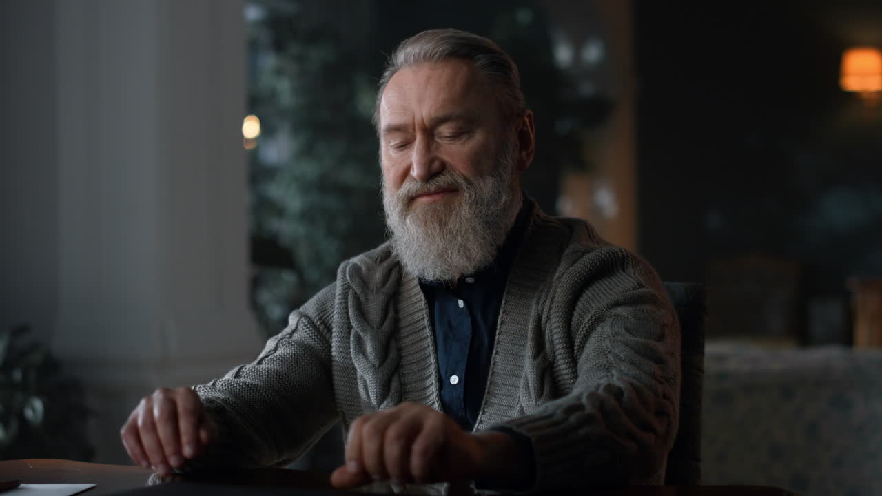 Free stock video - Senior man using laptop at home