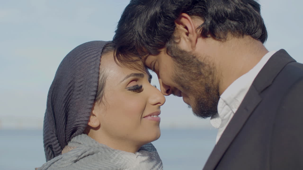 Beautiful Arabic Couple Looking At Each Other And Touching Noses | Free ...