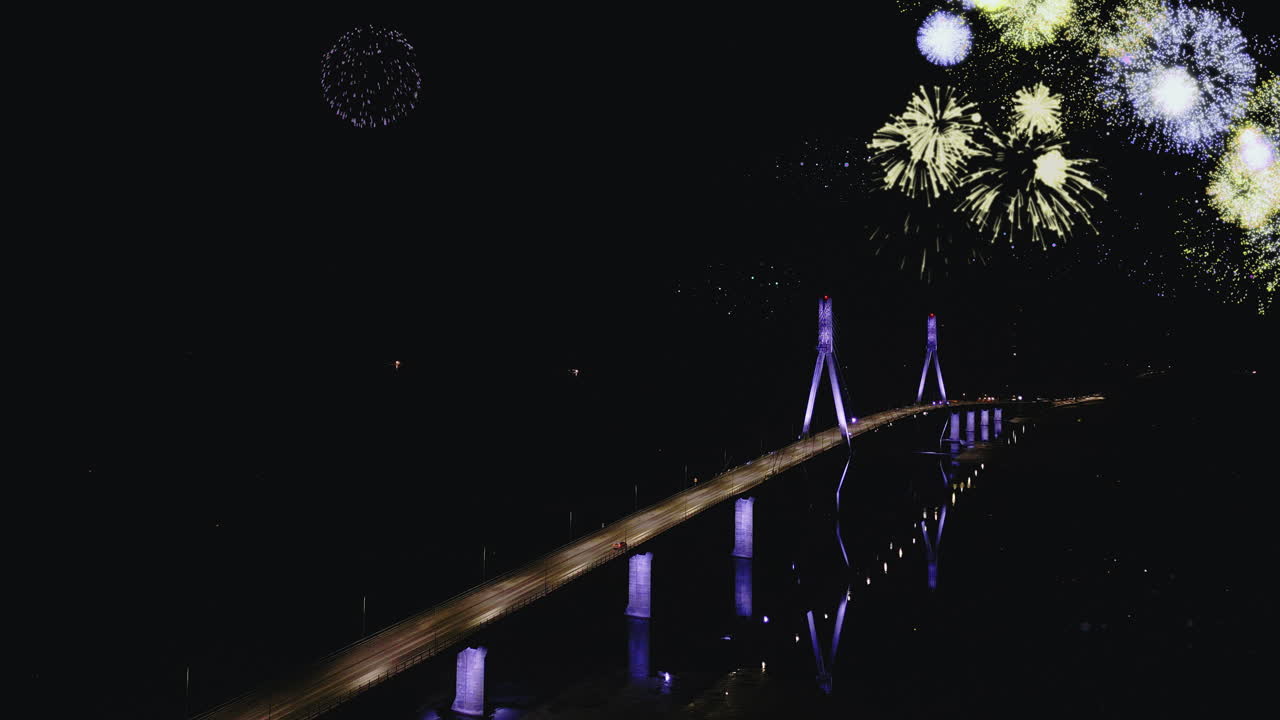 Premium stock video - Festive new year celebrations above illuminated ...
