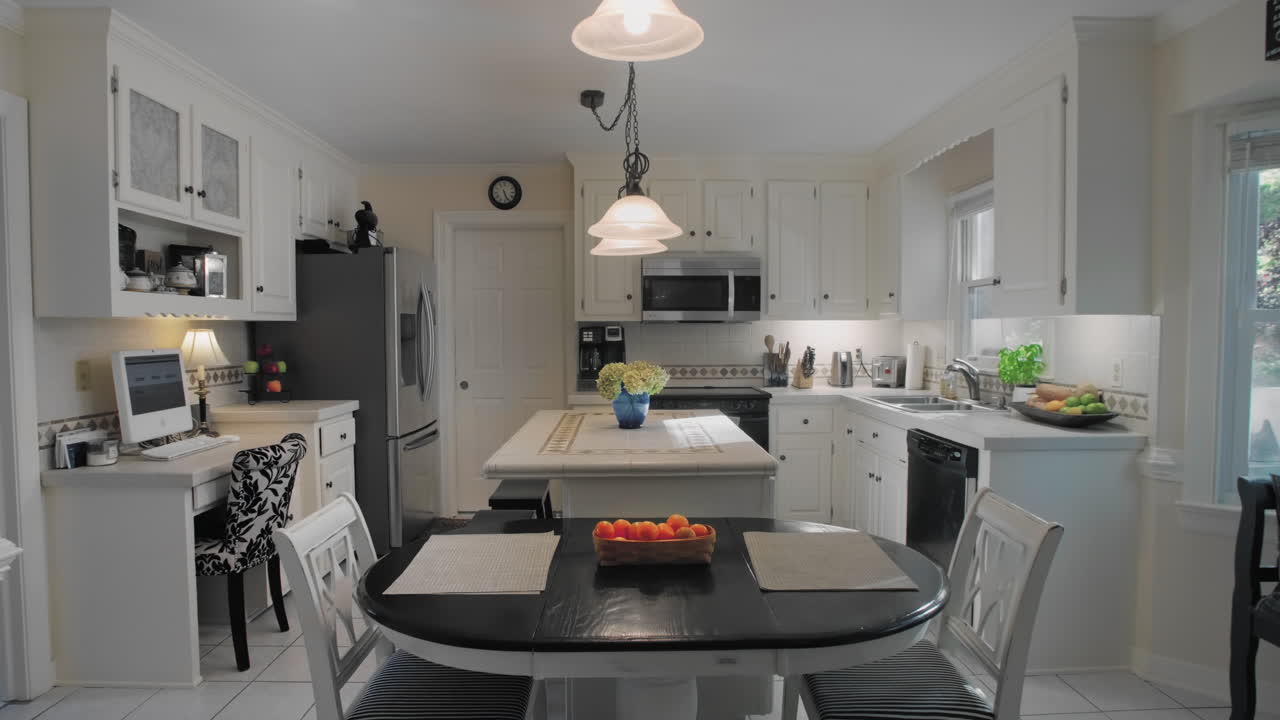 Premium stock video - Gimbal shot of and empty white kitchen in the suburbs