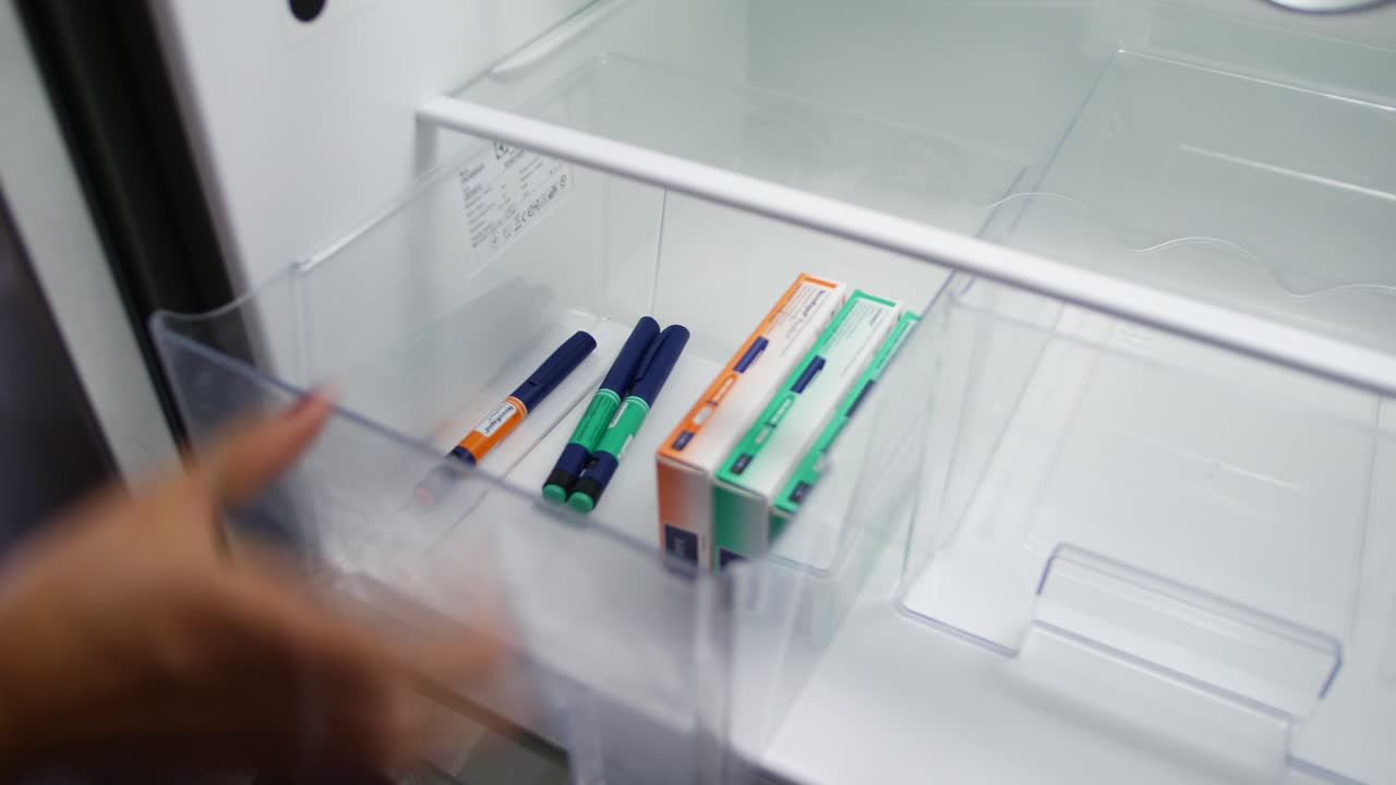 Premium stock video - Female hands put down boxes of insulin pens in ...