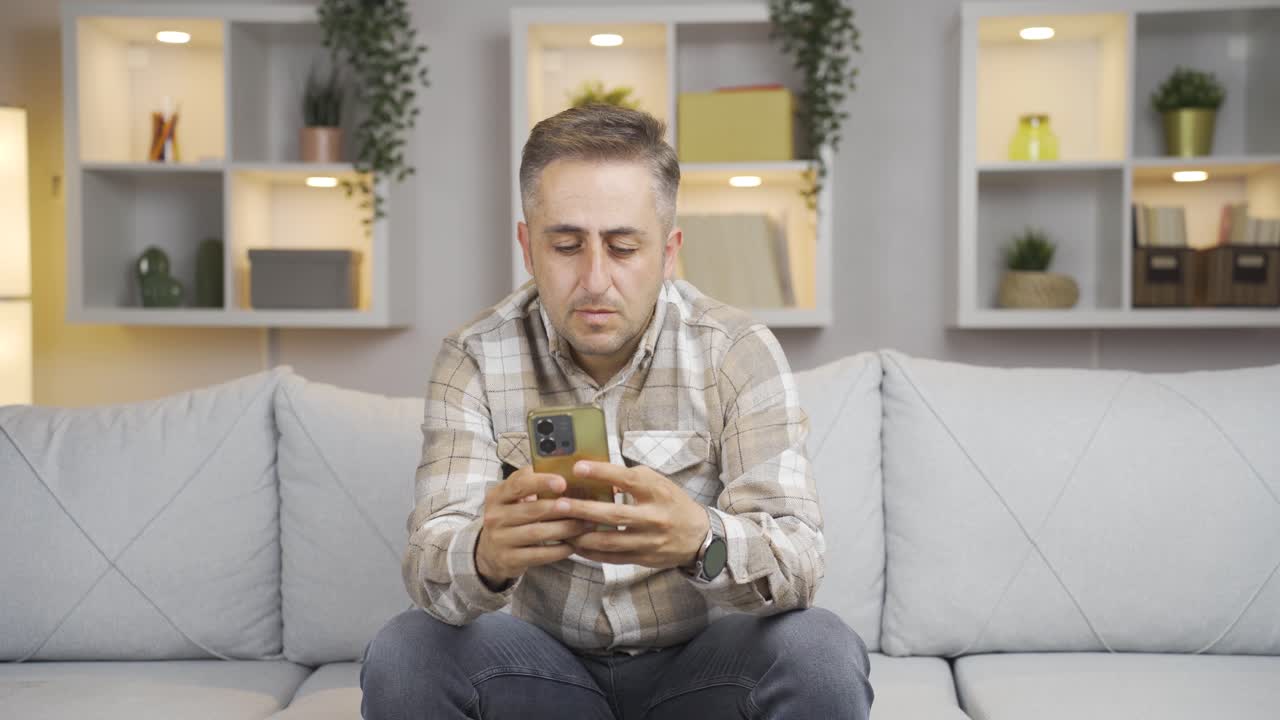 The man arguing in the messaging is angry. Premium Stock Video Footage