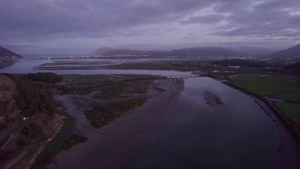 Premium stock video - Road bridge spans spanish river estuary ria tidal ...