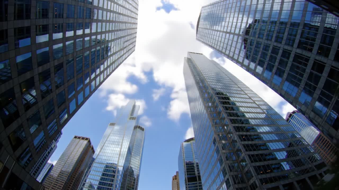 A captivating view from below the towering skyscrapers reveals the ...