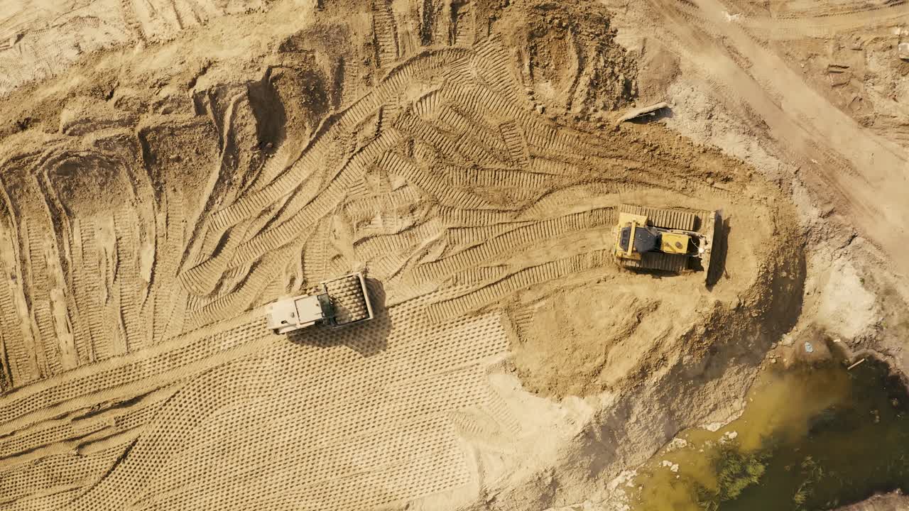 Aerial Photo Of A Steam Roller And A Bulldozer On A Construction Site ...