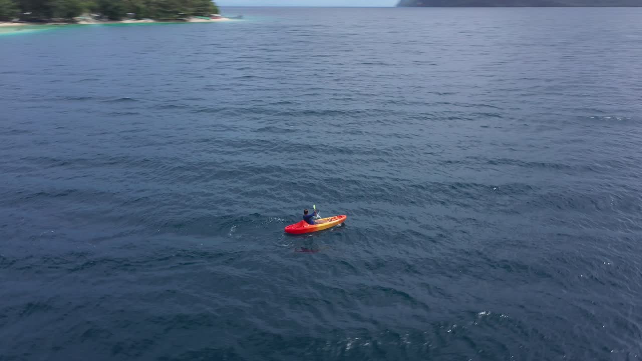 Man Kayaking In The Middle Of The Beach Of San Pablo Island, Southern ...