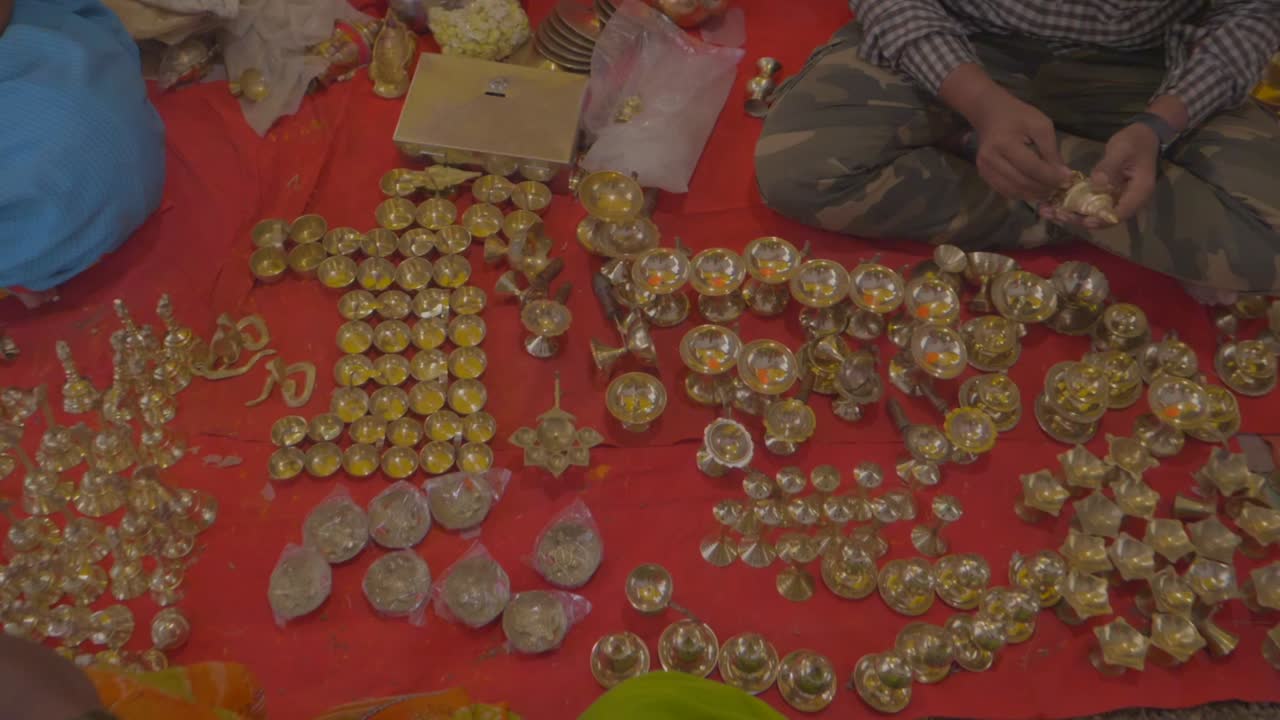 Premium stock video - Traditional brass aarti diya shop