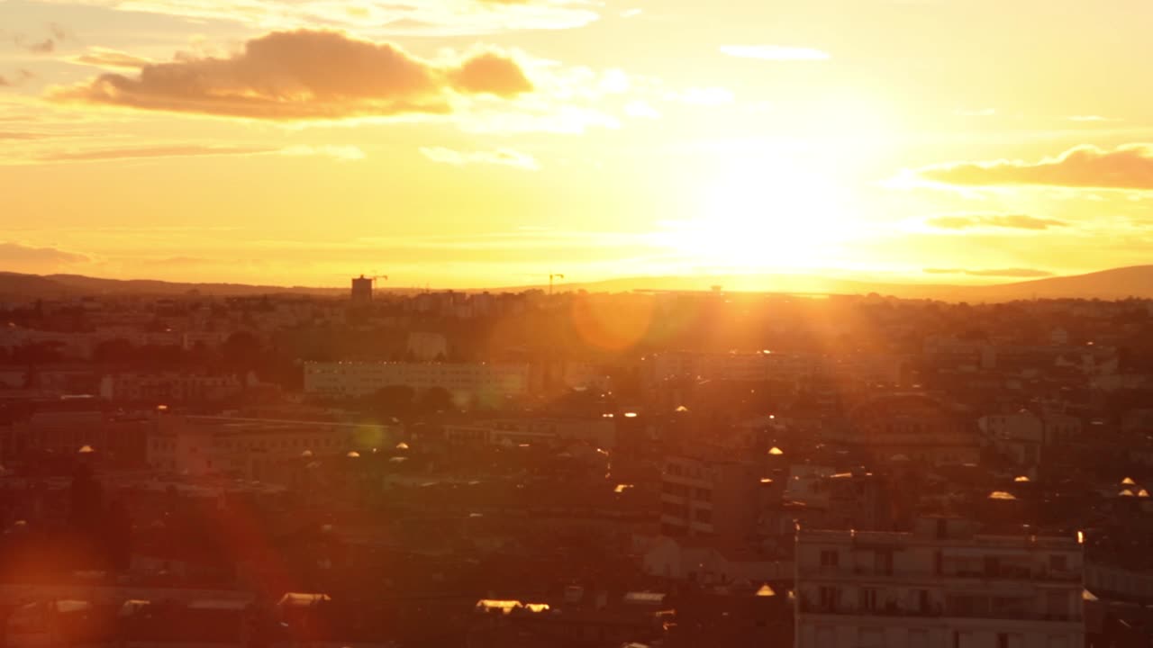 Free stock video - Sunset from high rooftop over the city of montpellier.