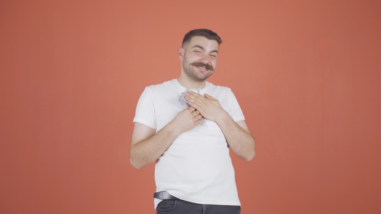 The man loves money. | Premium Stock Video Footage