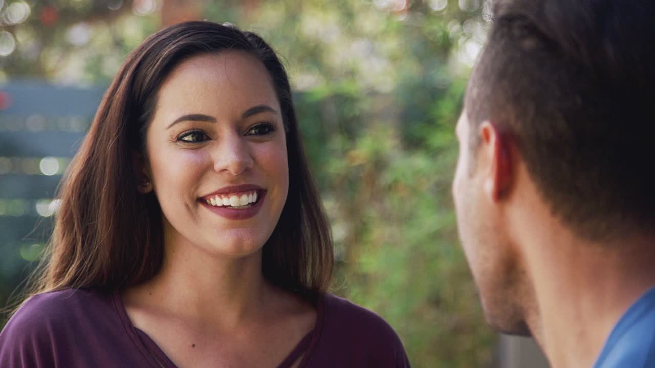 Premium stock video - Smiling hispanic couple talking and laughing in ...