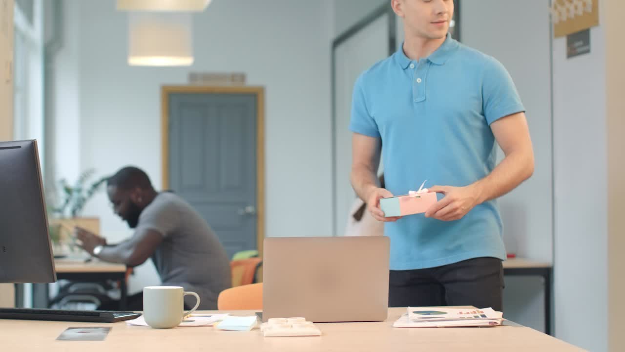 Romantic Man Leaving Gift At Coworking. Handsome Guy Delivering Kiss ...
