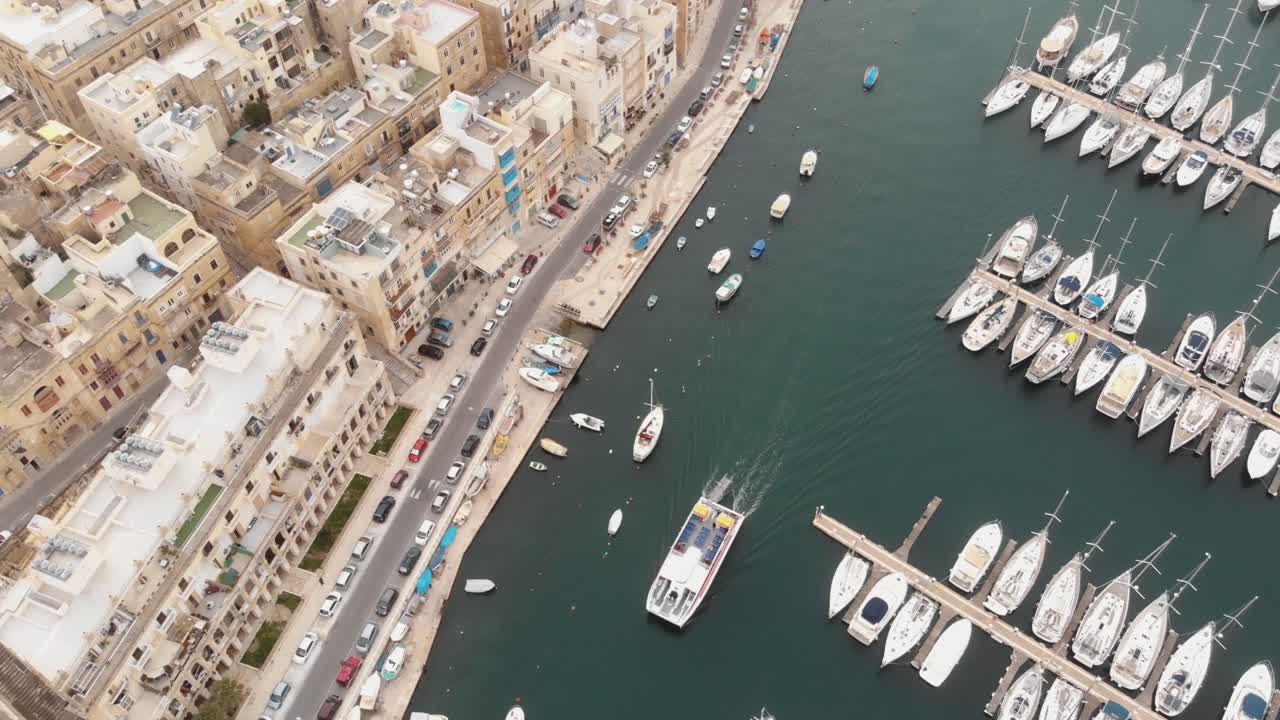 Bird's-eye, Panning Aerial 4k Drone Footage, Of A Marina Along A Water ...