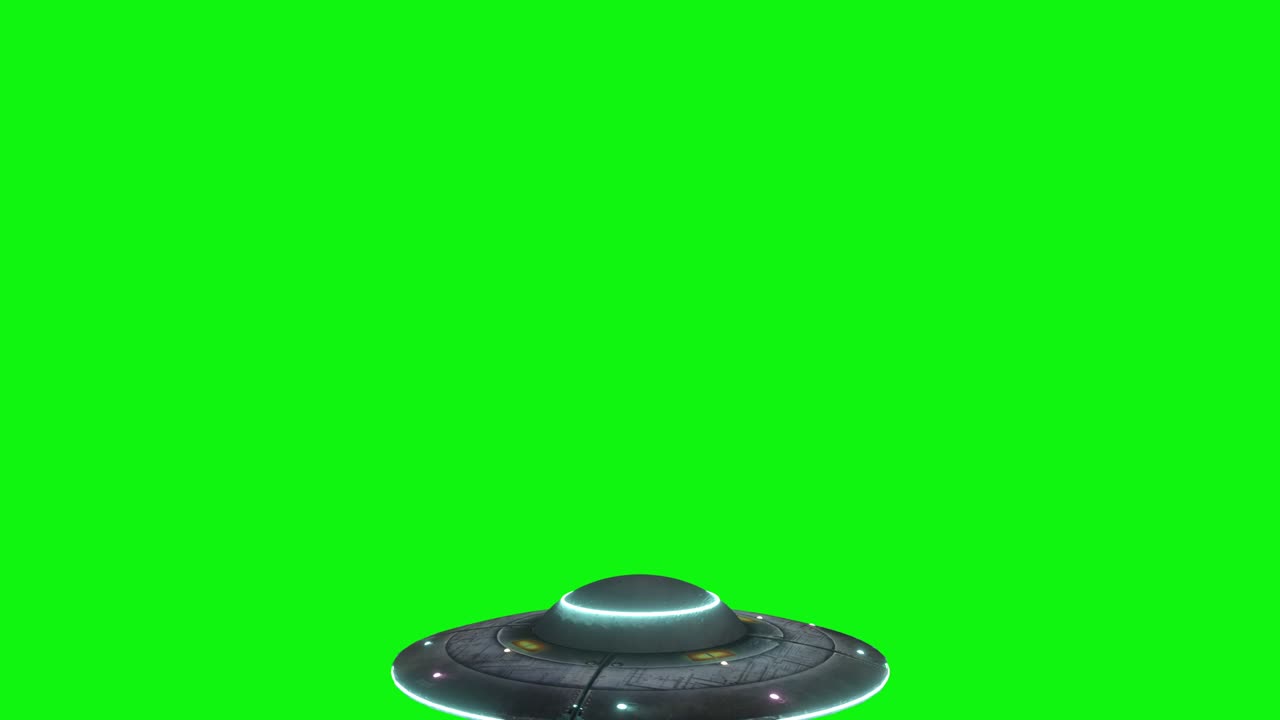 UFO transition on green screen. Alien flying saucer isolated on green ...