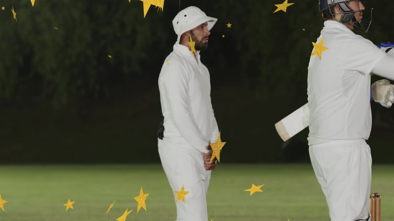 Bearded man on cricket pitch shifting gaze as batter entering, yellow ...