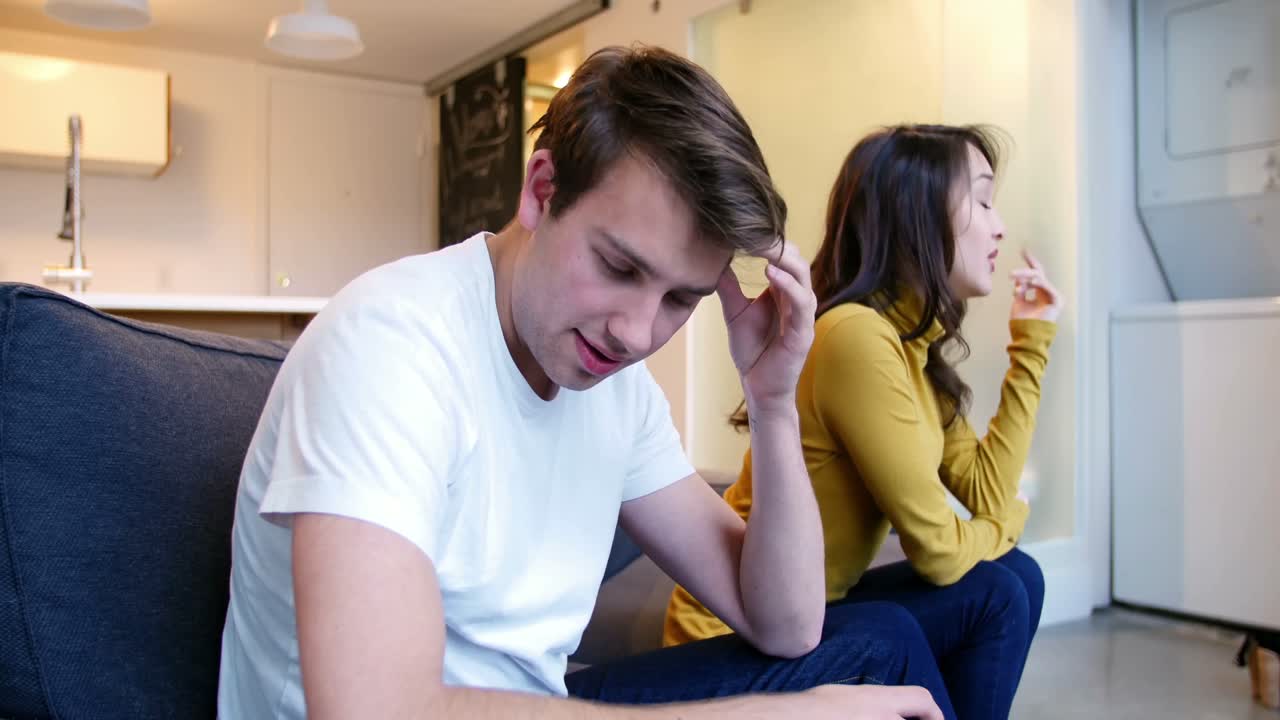 Premium stock video - Couple ignoring each other while argument in ...