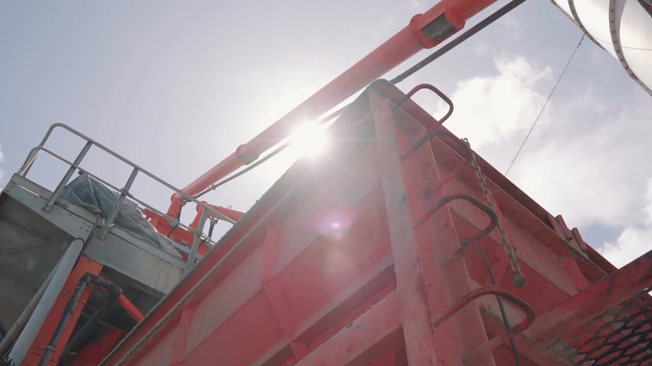 Construction Area With Concrete Being Piped Onsite Free Stock Video ...
