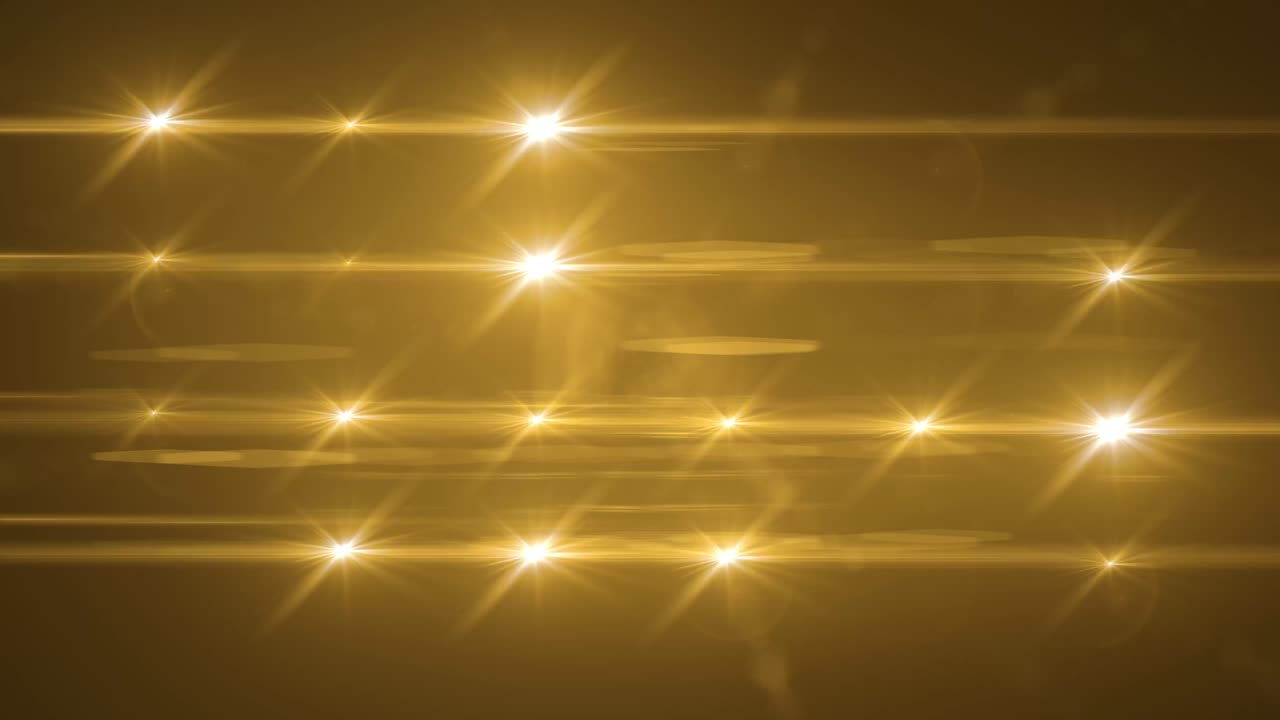 Premium stock video - Flashing light show yellow lights shining