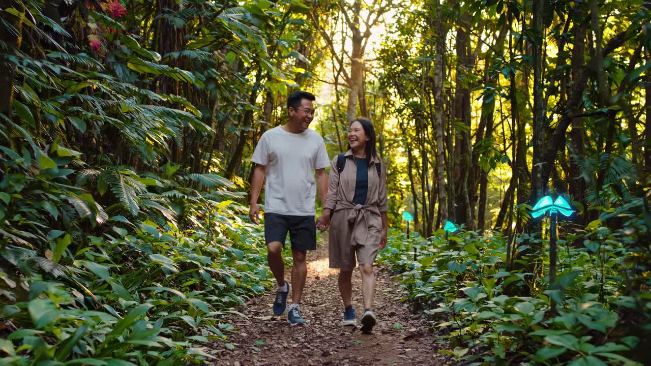 Couple Exploring a Forest with Augmented Reality Map | Vidéo de stock ...