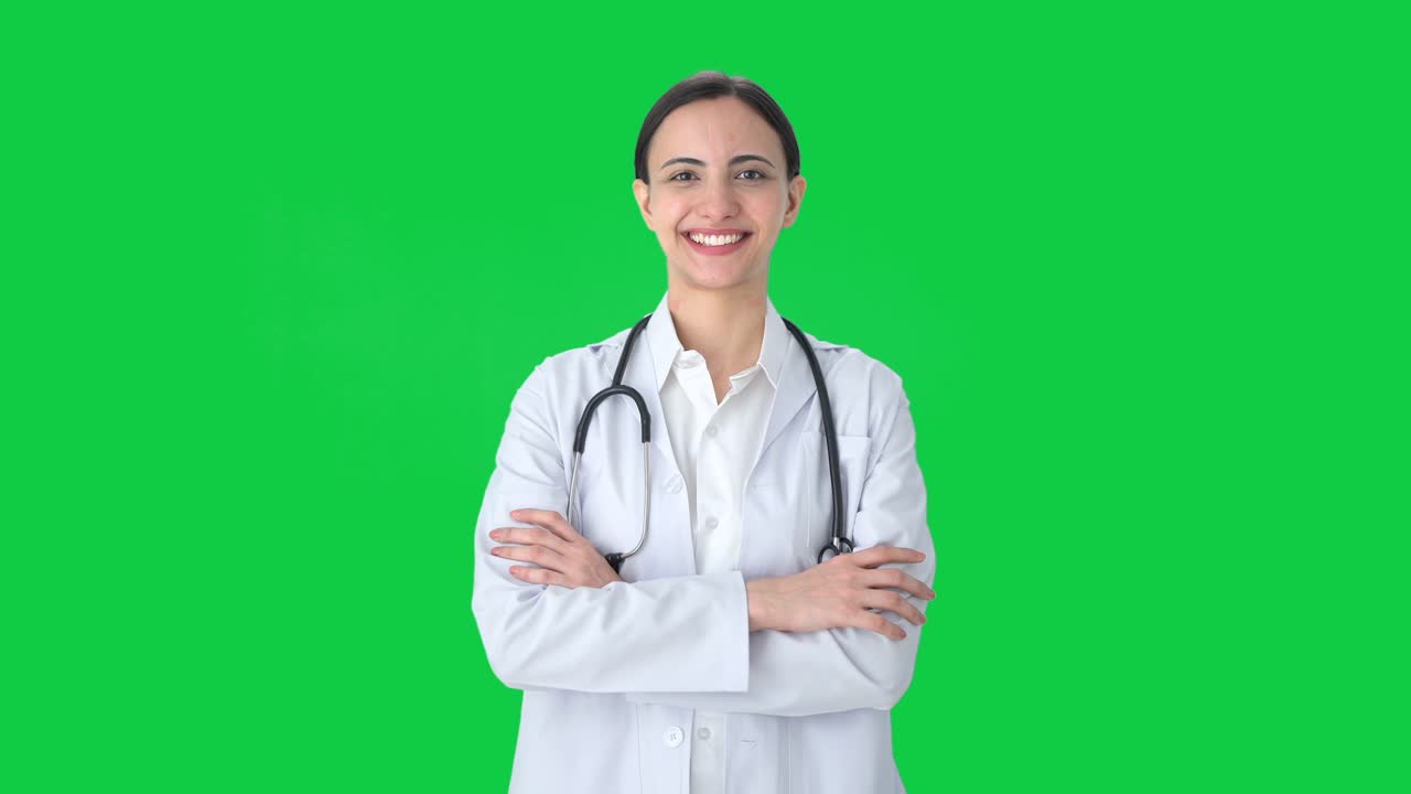 Premium stock video - Portrait of happy indian female doctor green screen