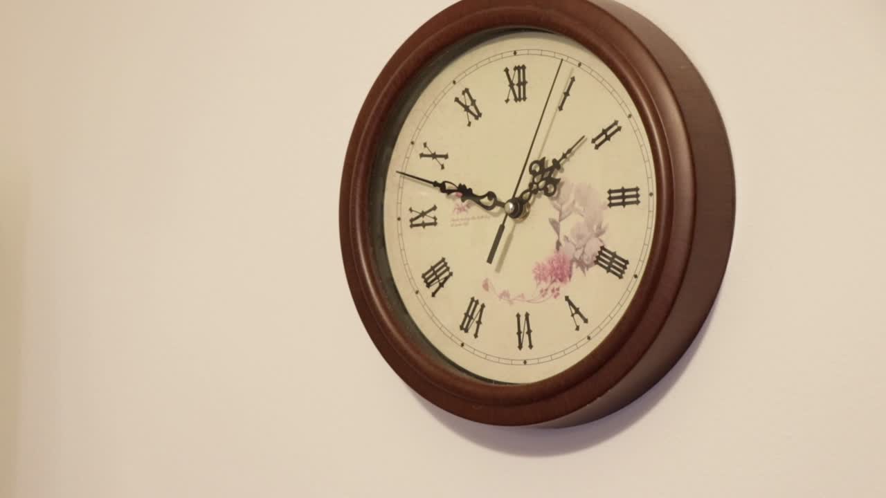 Premium stock video - A watch on the wall in slow motion