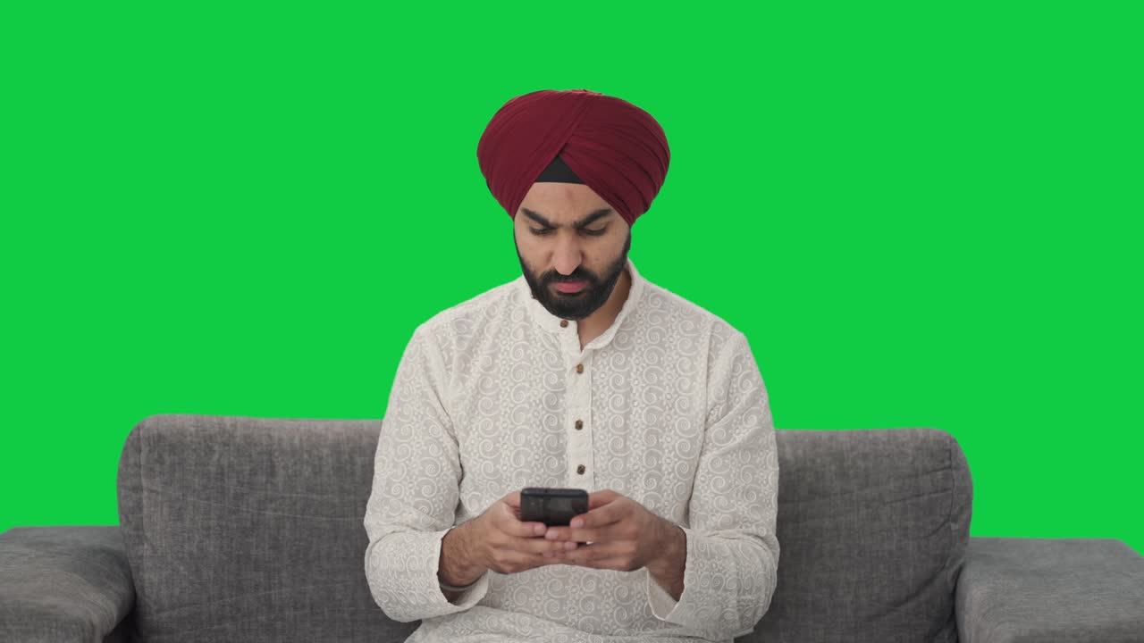 Angry Sikh Indian Man Messaging Someone Green Screen Free Stock Video ...
