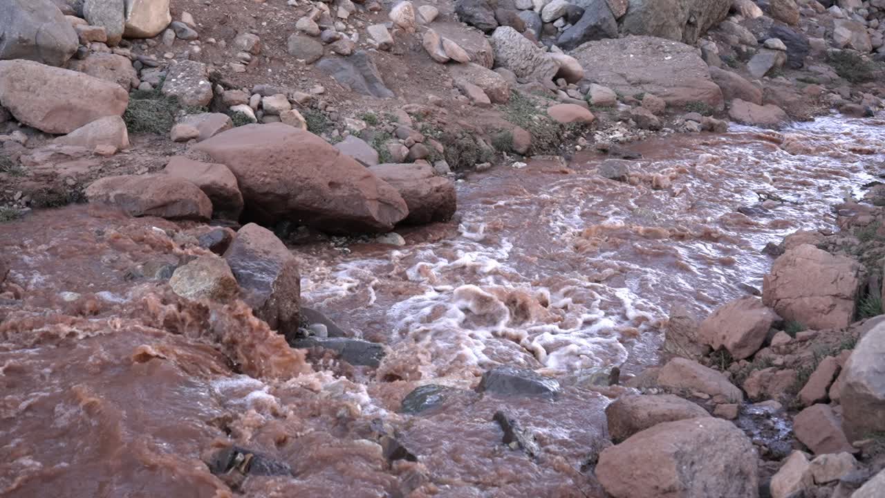 Premium stock video - Powerful mountain river carrying sediments ...