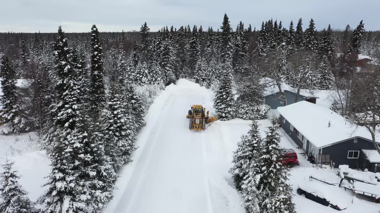 Drone video captures the power and a snow plow in action as it clears ...