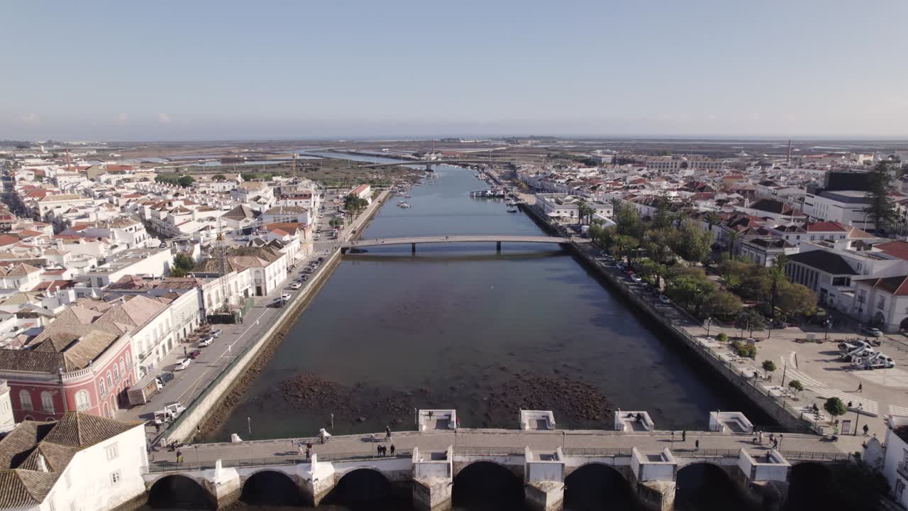 FlyOver Gilão RIver With People Crossing Old Bridge Free Stock Video ...