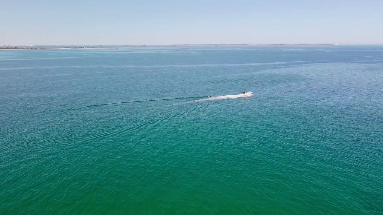 Powerboat Moves On Ocean Surface, Propelled Forward By Powerful Engines ...