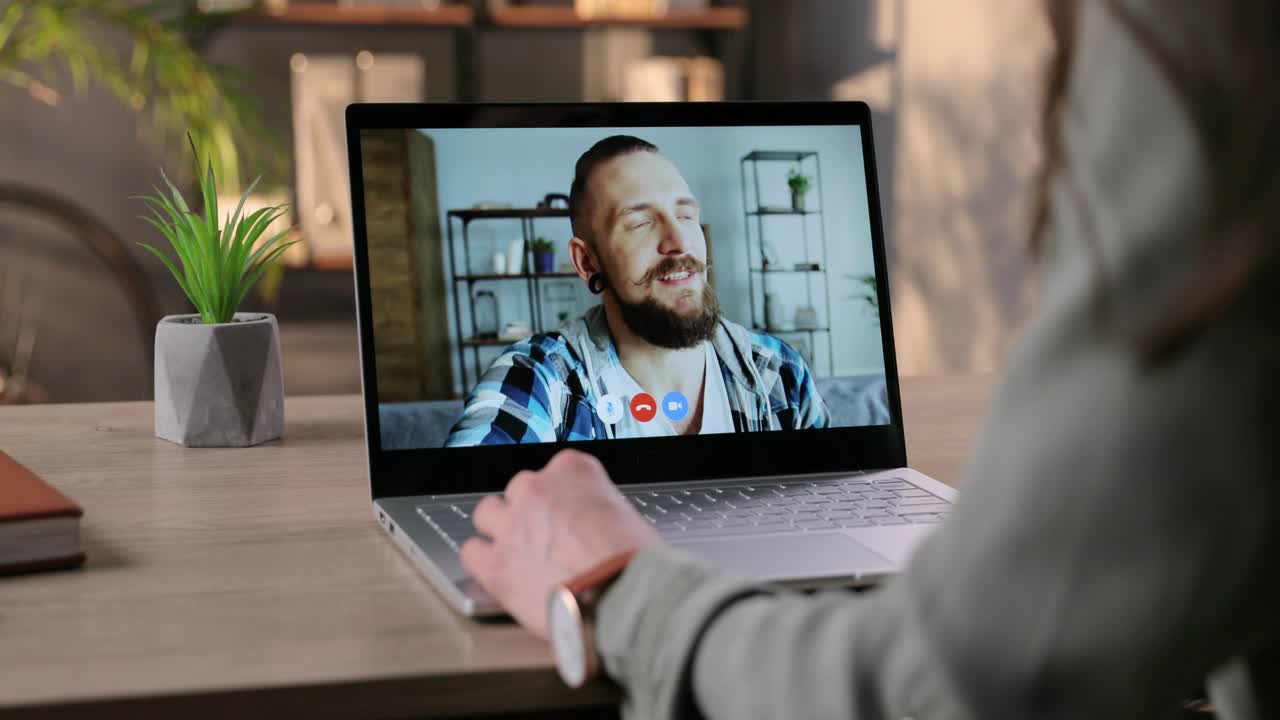 Free stock video - Girl talking on video call with handsome man while ...