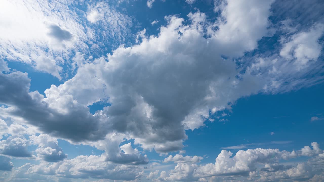 blue sky white clouds. puffy fluffy white clouds. cumulus cloud cloudscape timelapse. summer ...