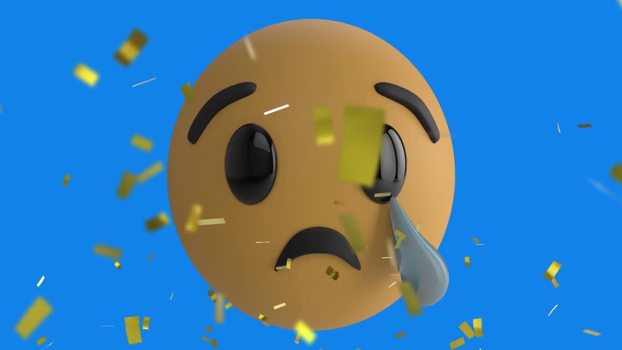 Digital animation of golden confetti falling over crying face emoji ...
