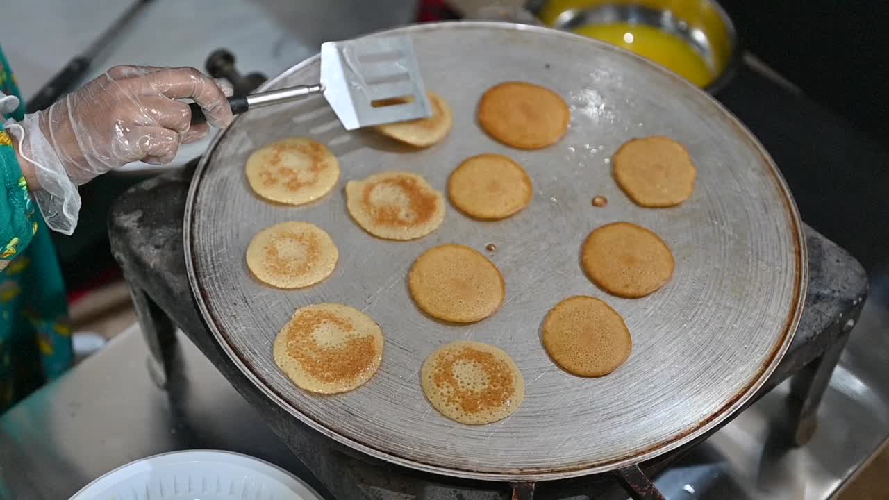 Premium stock video - A mini pancake-like arabic dish called chabab ...