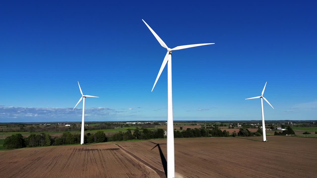 Wind turbines in northeast wisconsin turn in the wind producing ...