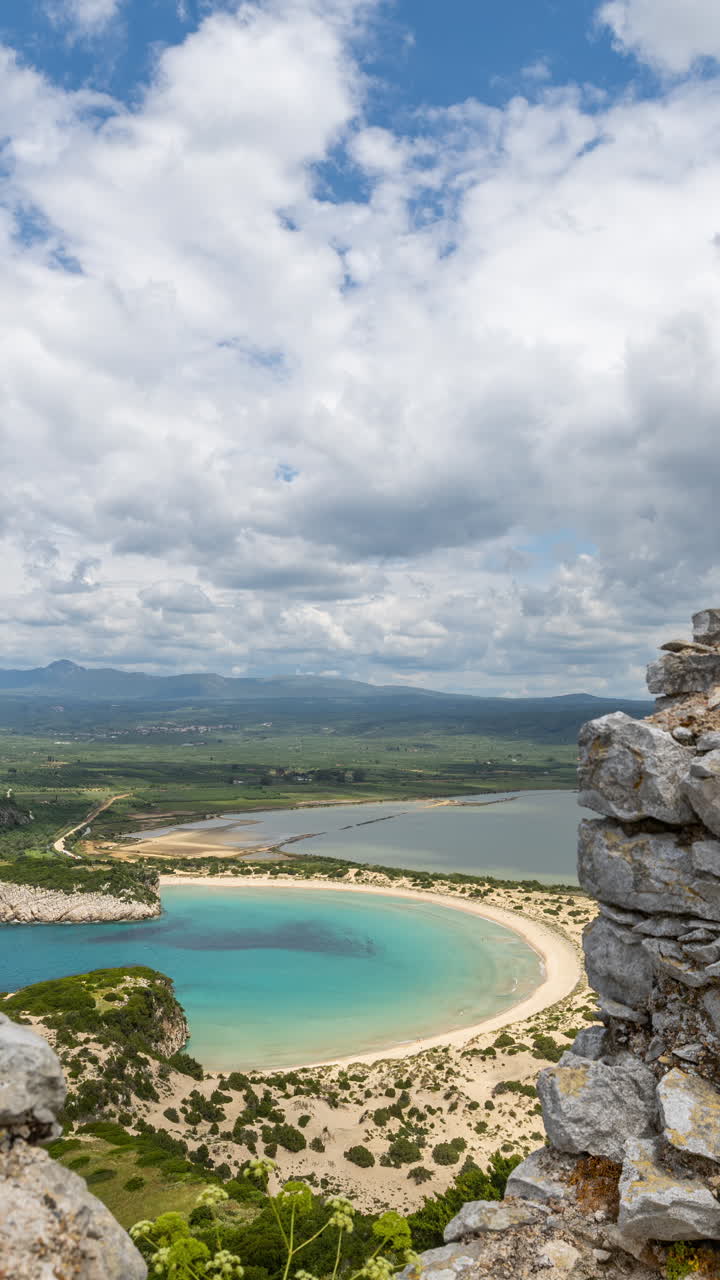 Premium stock video - Voidokilia beach in greece in vertical
