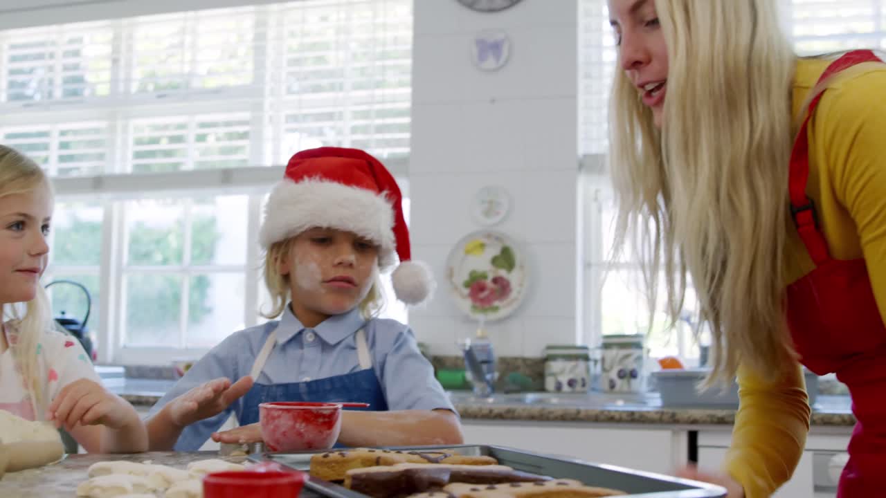 Family making christmas cookies at home Premium Stock Video Footage