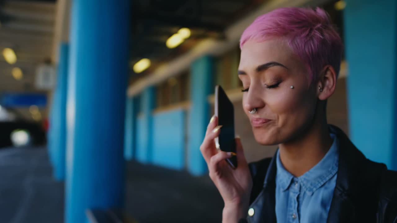 Pink hair woman talking on mobile phone 4k Premium Stock Video Footage