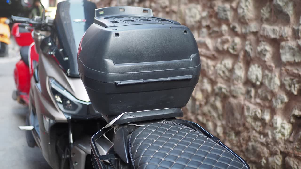 Motorcycle Top Box on Scooter | Premium Stock Video Footage